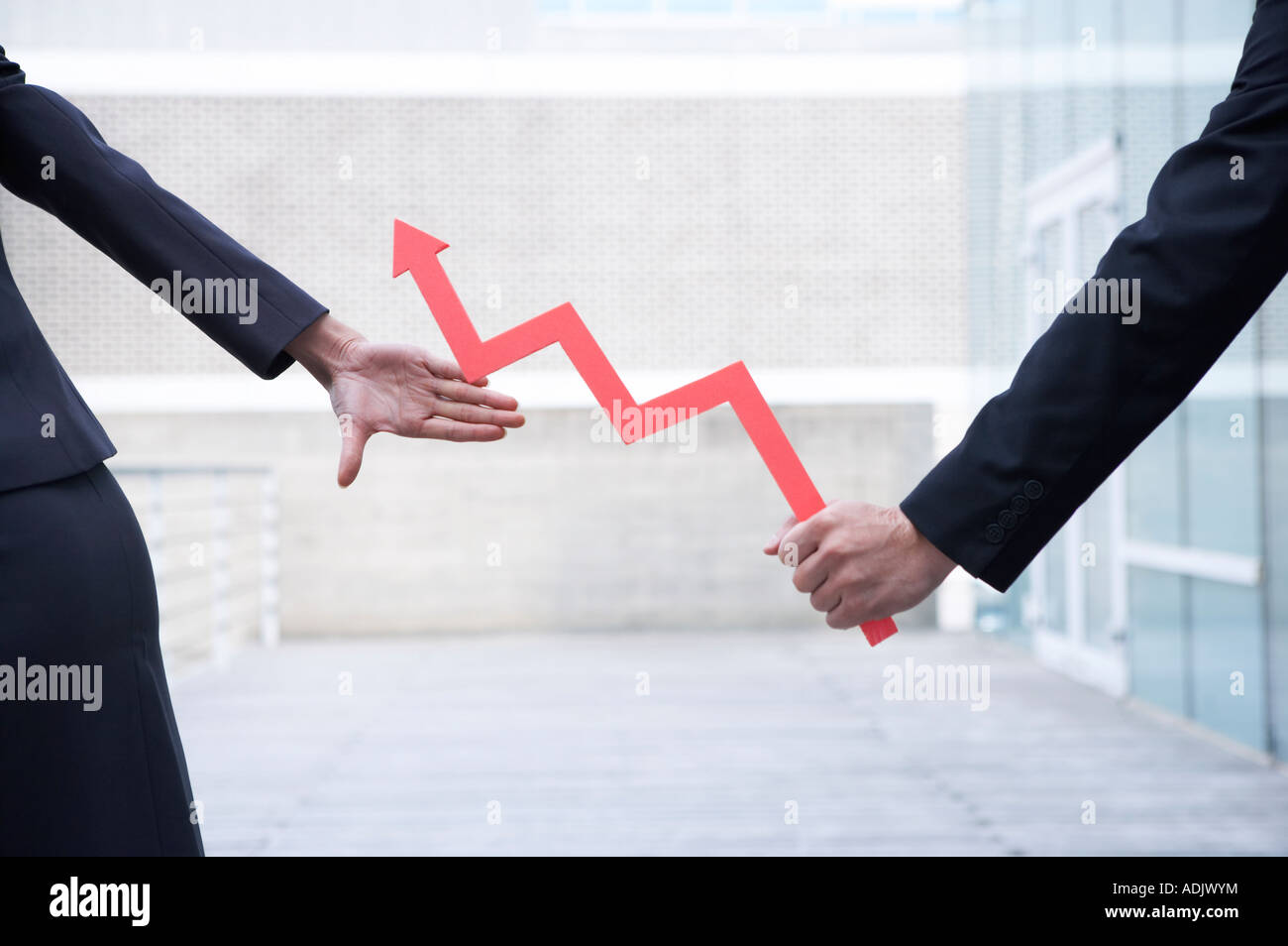 A man giving the ascending arrow to a woman Stock Photo - Alamy