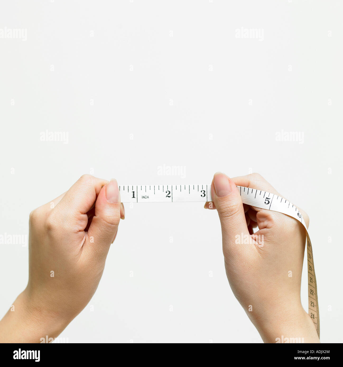 Holding tape measure body part hi-res stock photography and images - Alamy