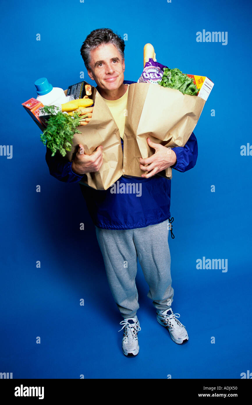 Two person carrying banana hi-res stock photography and images - Alamy
