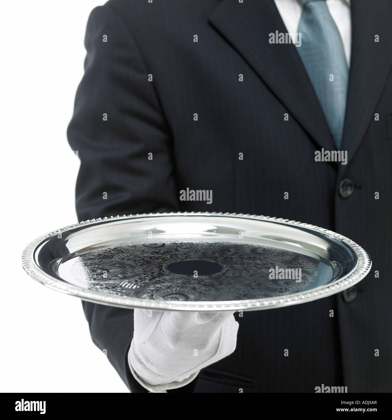 A hand holding up a plate Stock Photo - Alamy