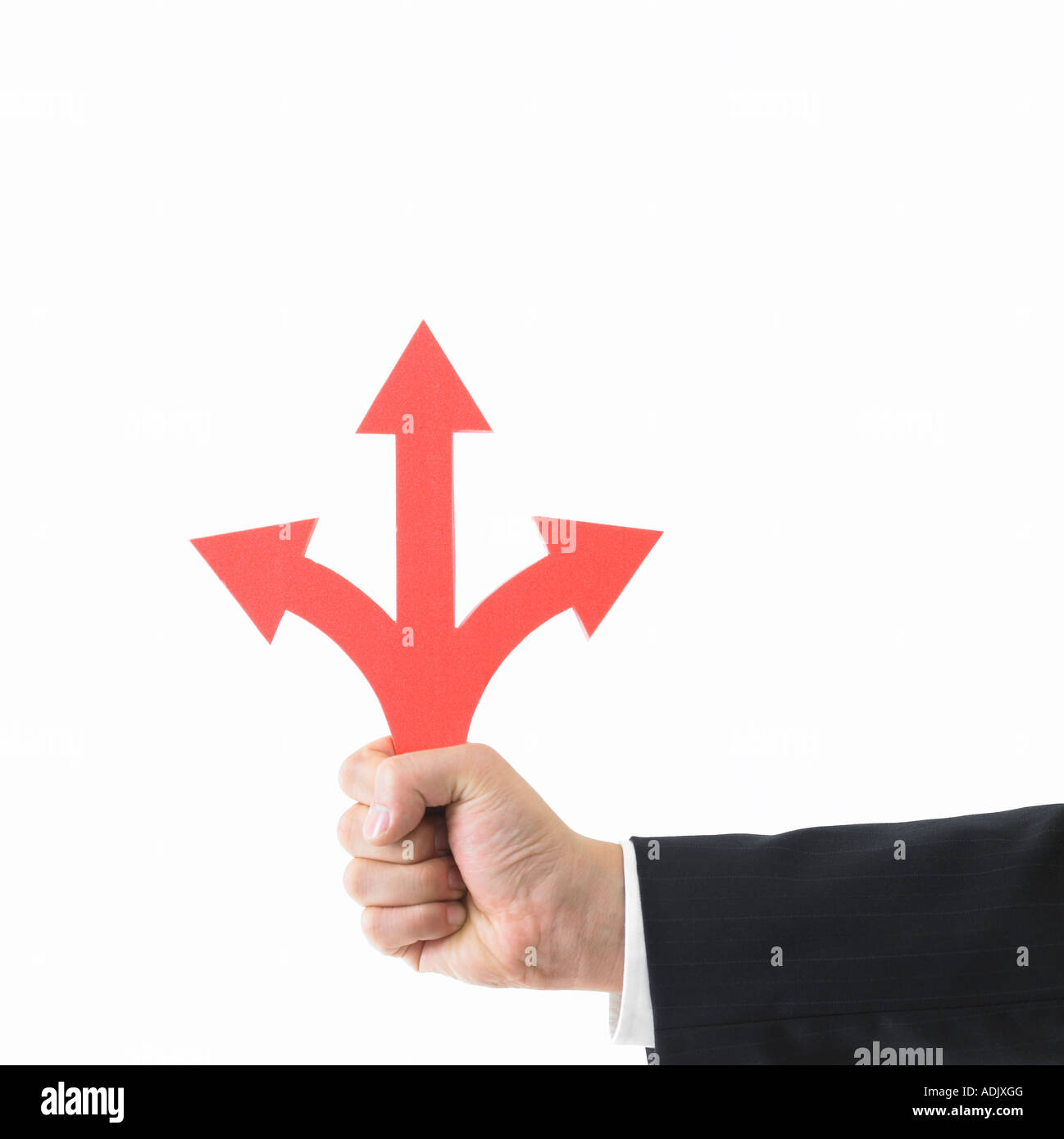 A hand holding an ascending arrow Stock Photo - Alamy