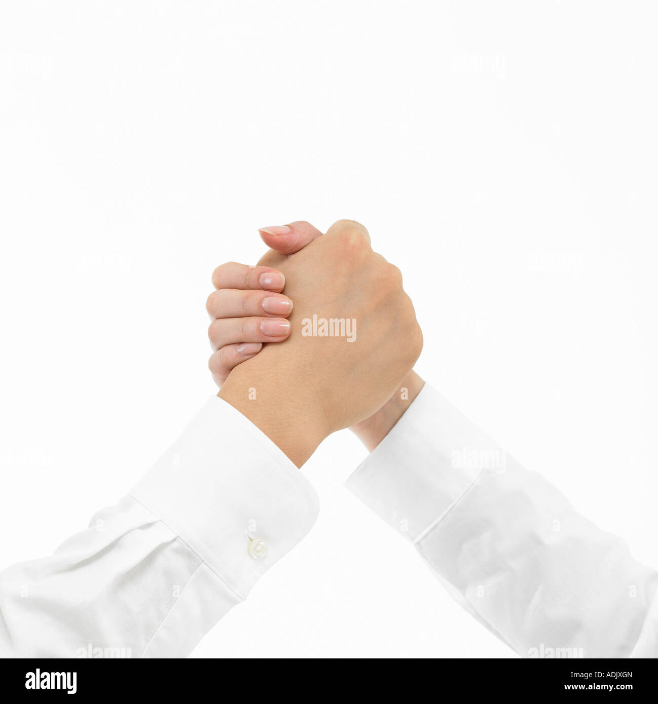 Two hands holding each other Stock Photo - Alamy