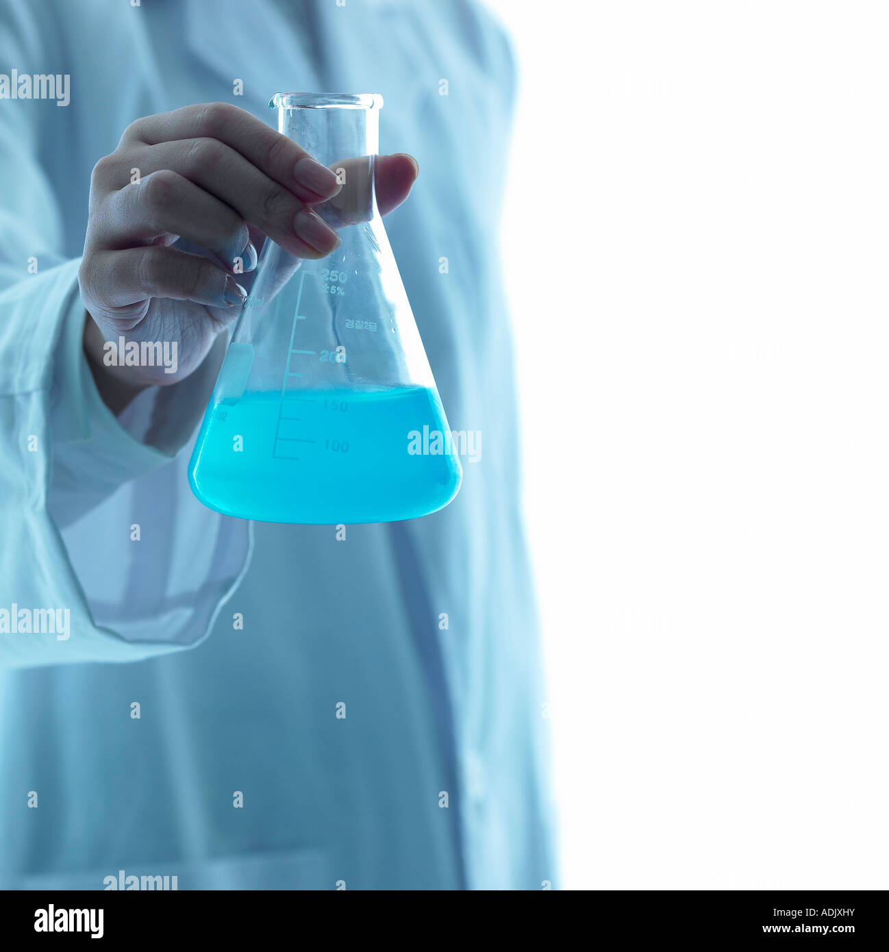 A hand making a chemical experiment in the laboratory Stock Photo - Alamy