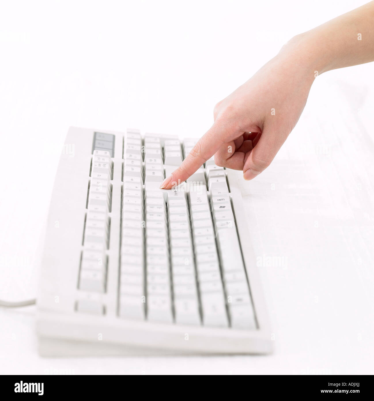 A woman's hand typing a keyboard Stock Photo - Alamy