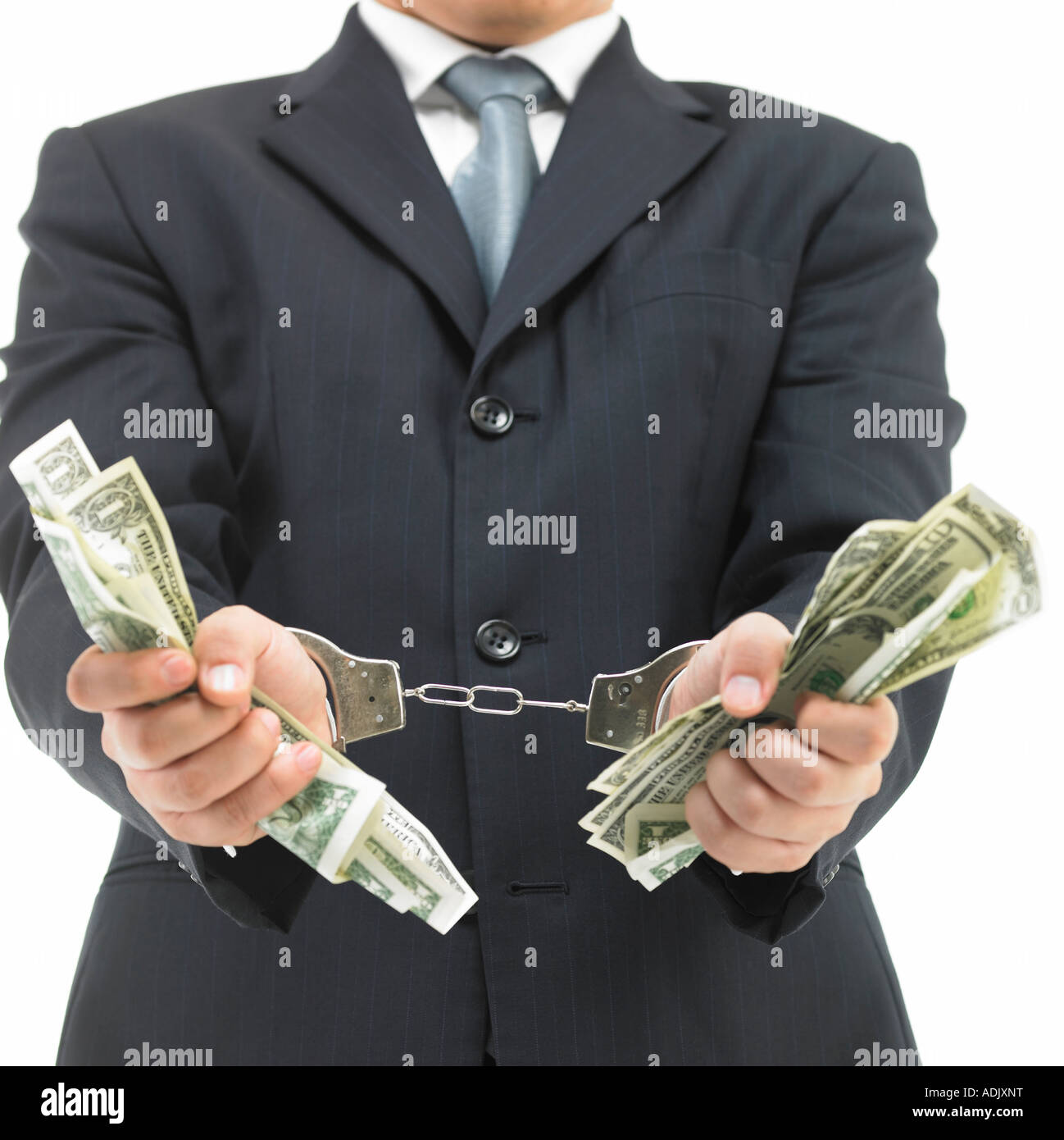 A man arrested on a charge of embezzlement Stock Photo - Alamy