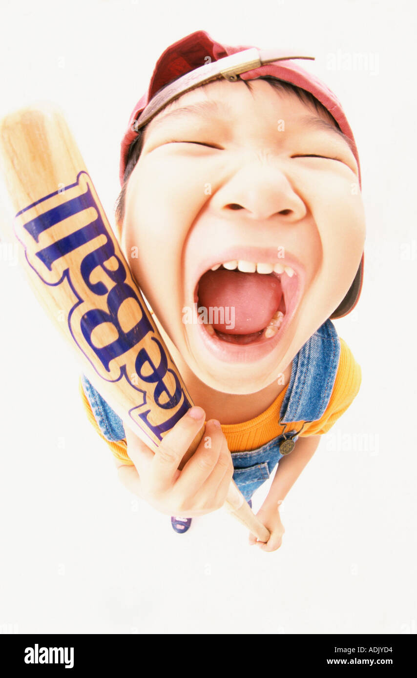 Boy with a baseball bat hi-res stock photography and images - Alamy