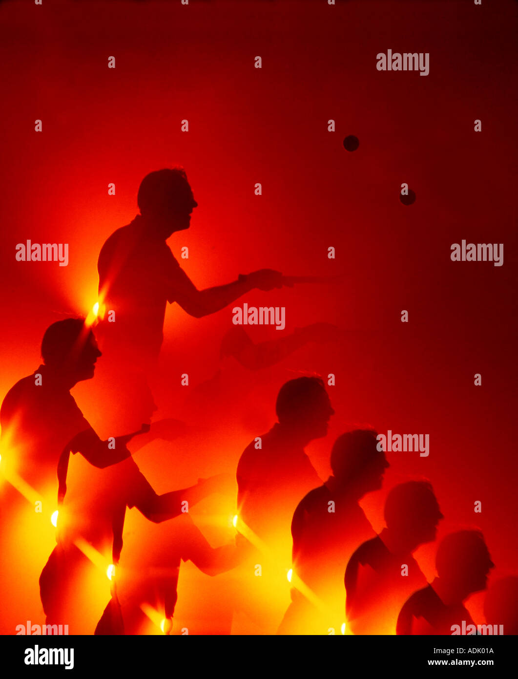 Sunset silhouette repeated of a man bouncing a tennis fall on his ...