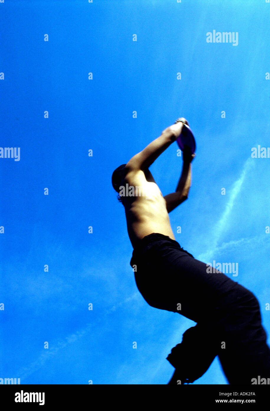 action man catching frisbee Stock Photo - Alamy