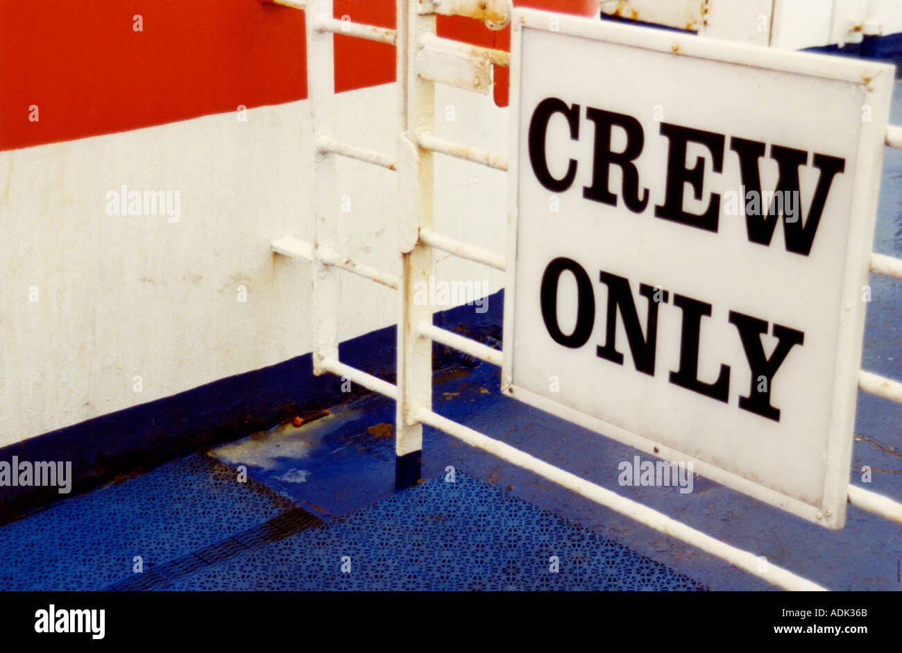 Crew only sign post Stock Photo - Alamy