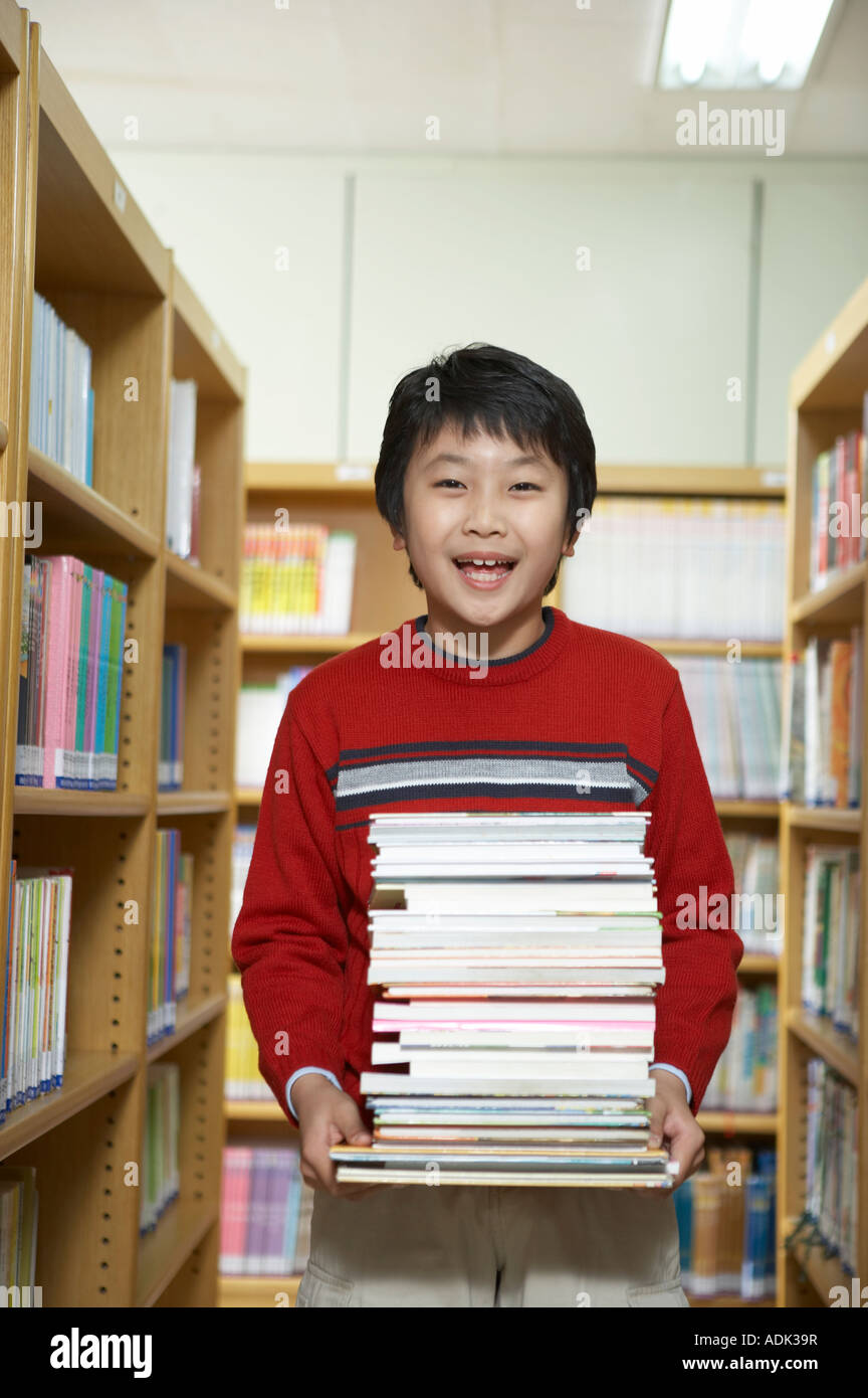 A boy in the library Stock Photo - Alamy