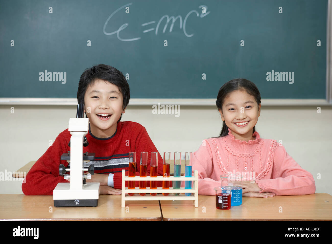 A girl and a boy in the science laboratory Stock Photo - Alamy