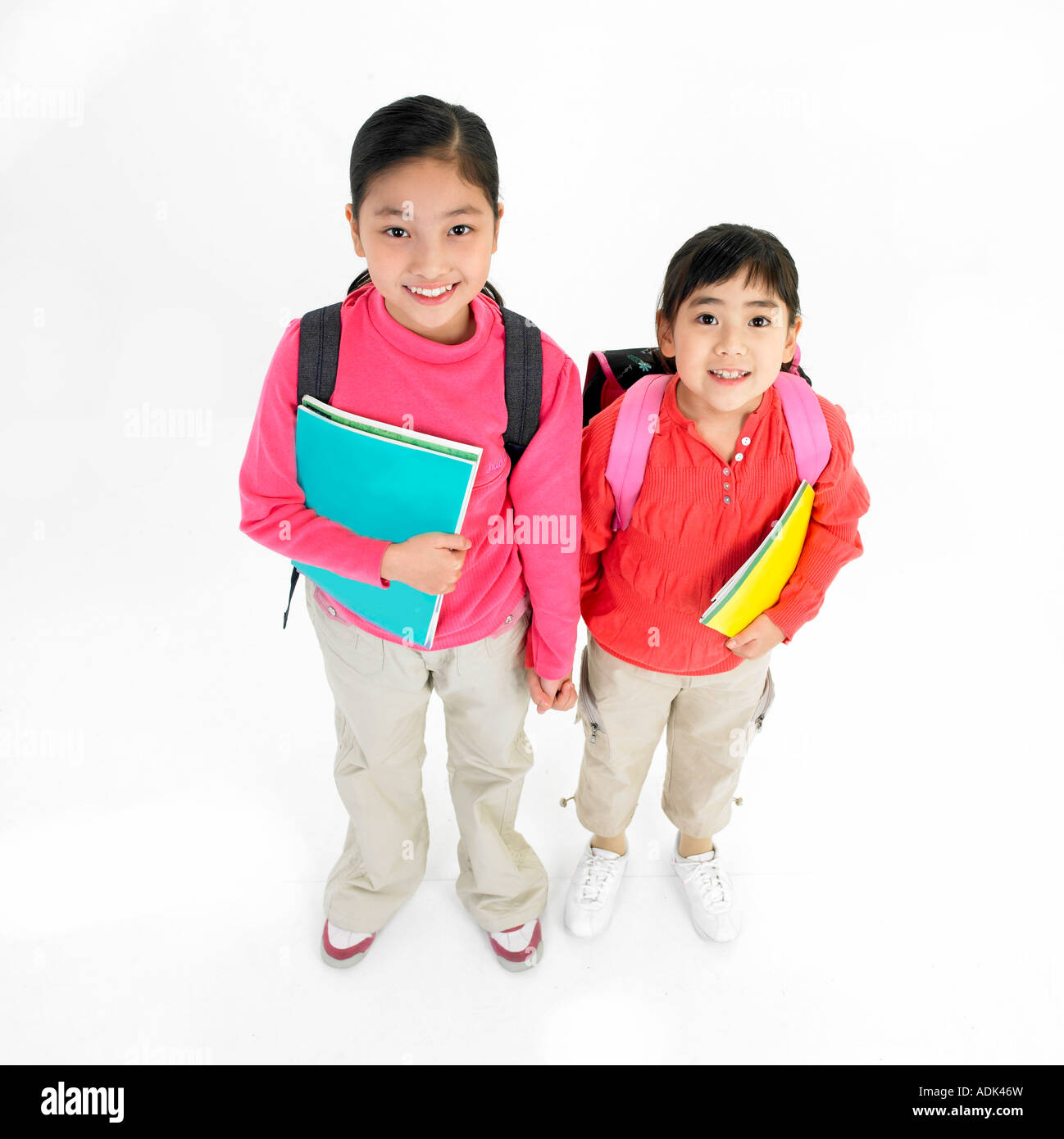 girls going to school with a smile Stock Photo - Alamy
