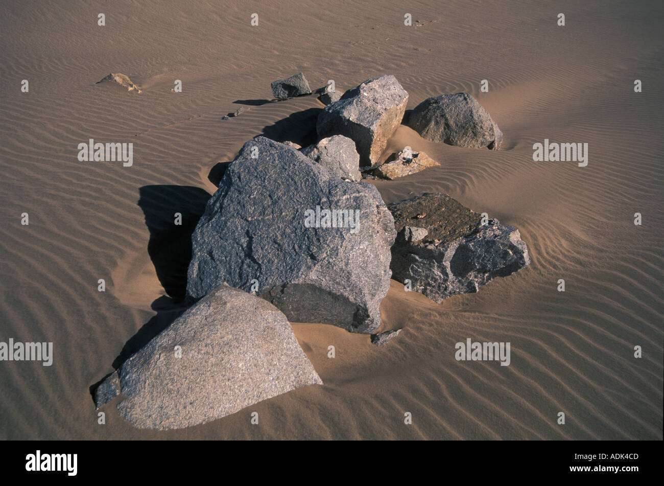 Namibia Exposed granite rock through sand of the Namib desert Namibia ...