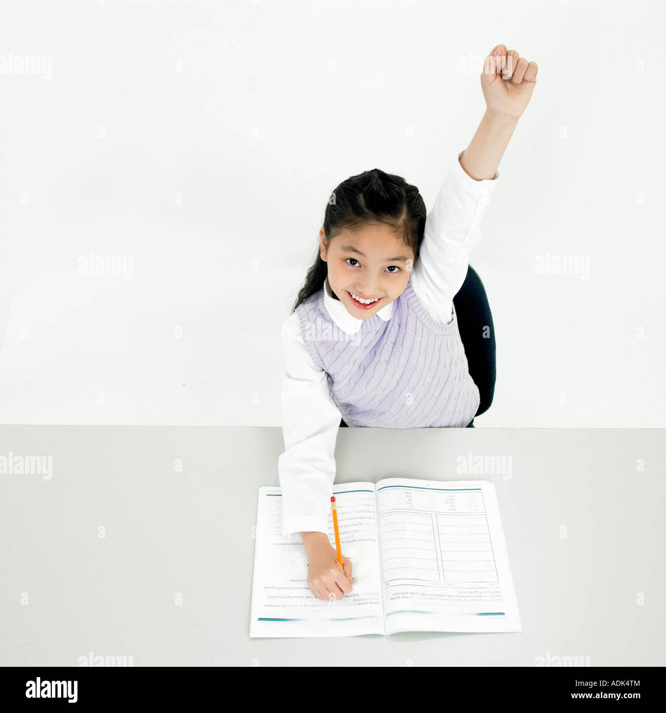 Woman raise hand desk hi-res stock photography and images - Alamy