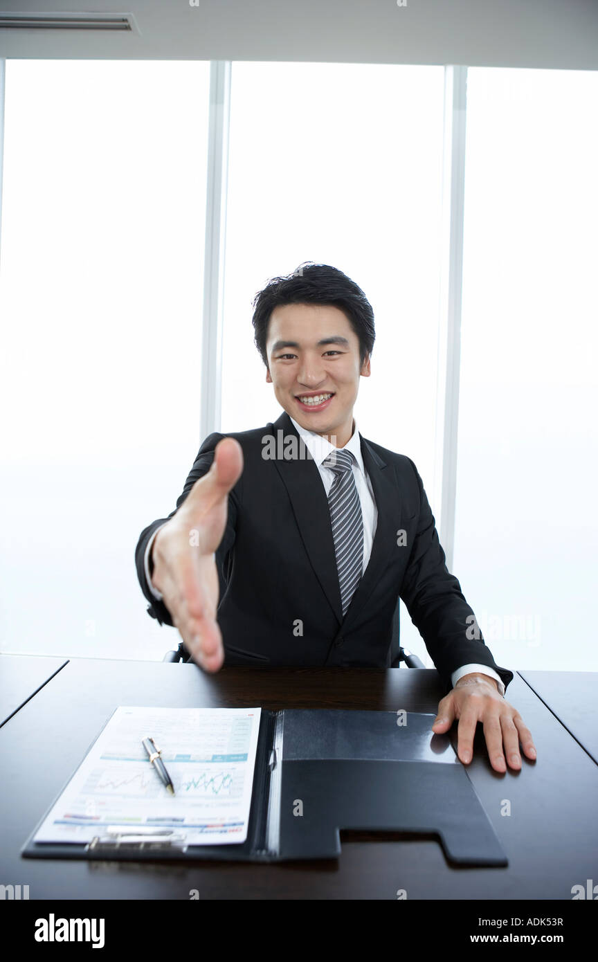 a businessman offering his hand Stock Photo - Alamy a businessman offering his hand Stock Photo - Alamy