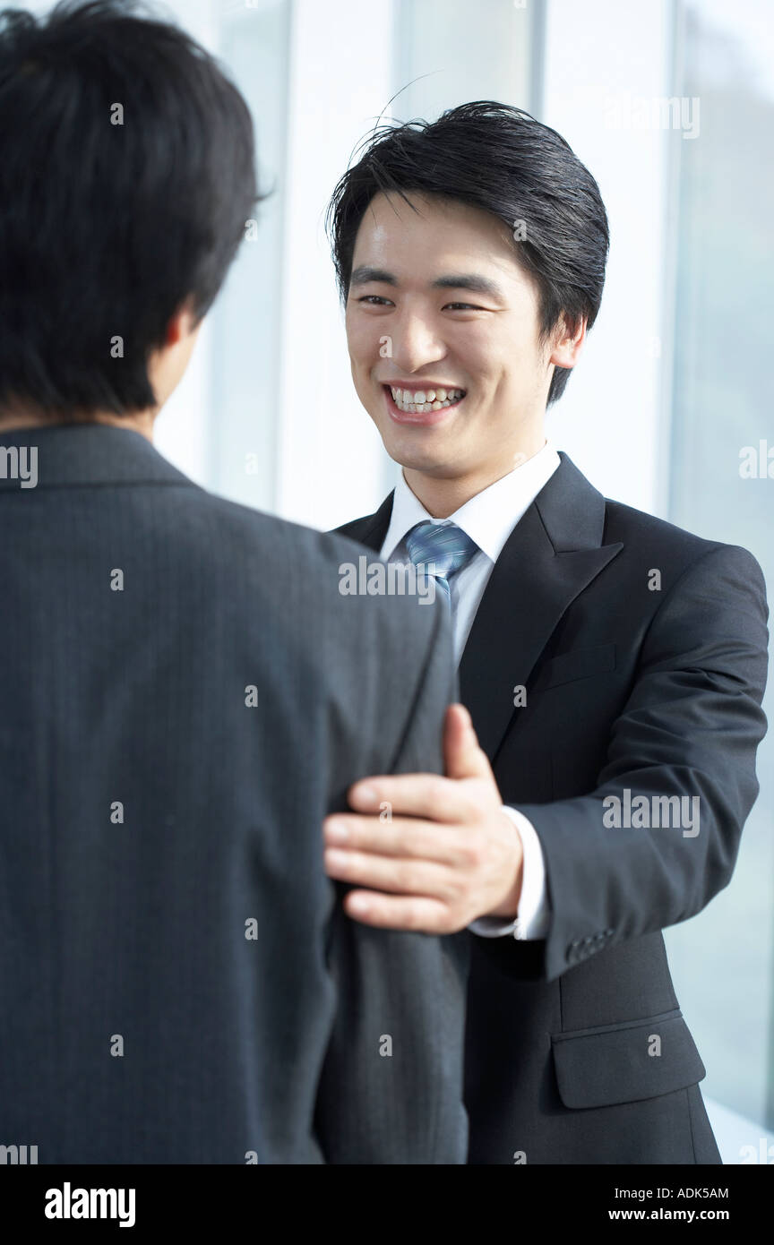 Encouraging cooperation hi-res stock photography and images - Alamy