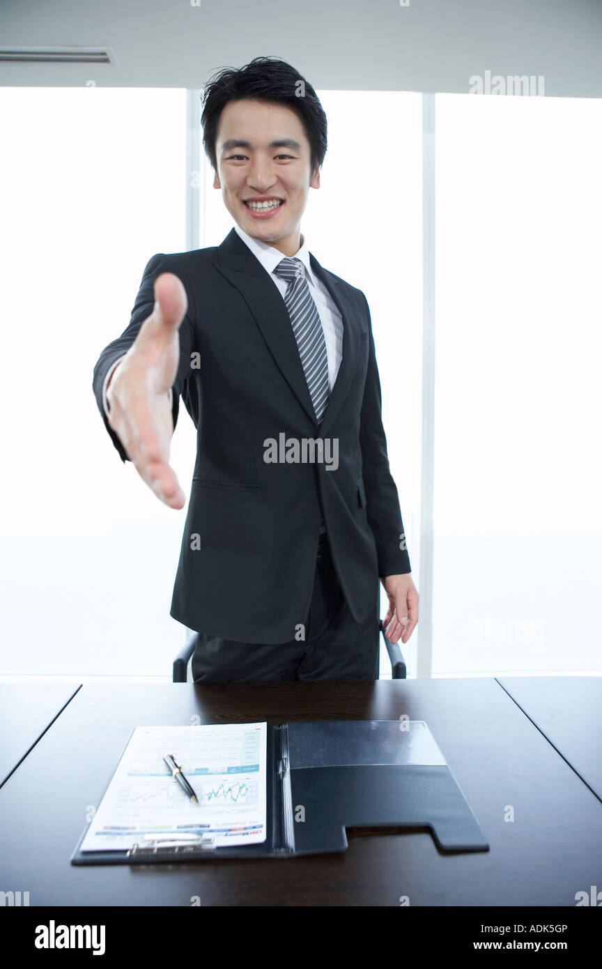 a businessman offering his hand Stock Photo - Alamy a businessman offering his hand Stock Photo - Alamy