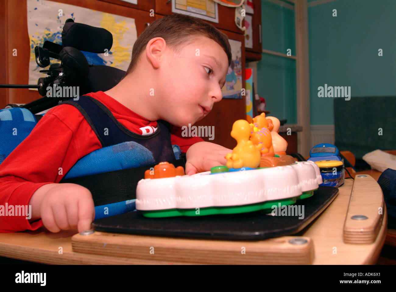 Young disabled boy in wheelchair ,London, UK Stock Photo - Alamy
