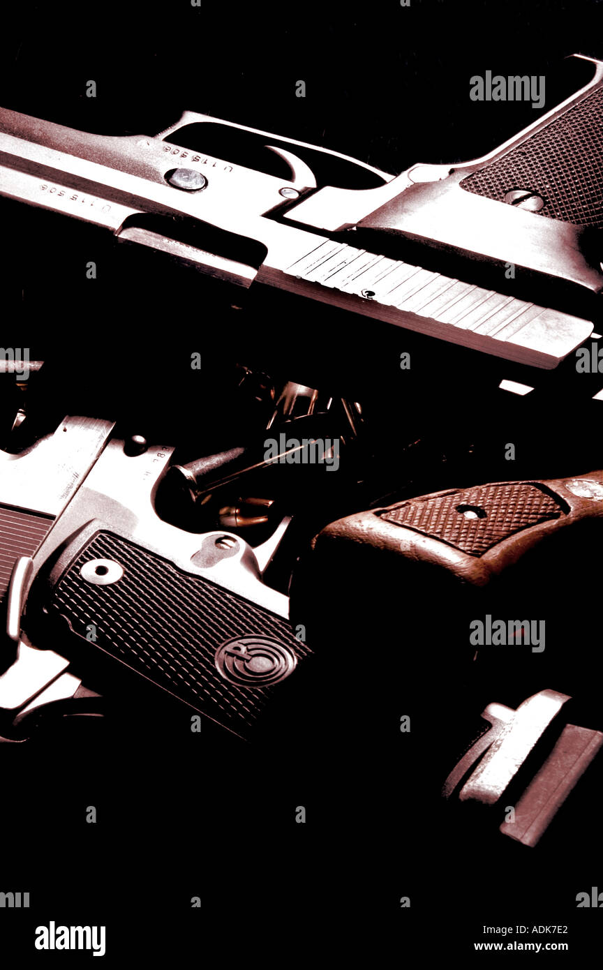 Pile of handguns Stock Photo - Alamy