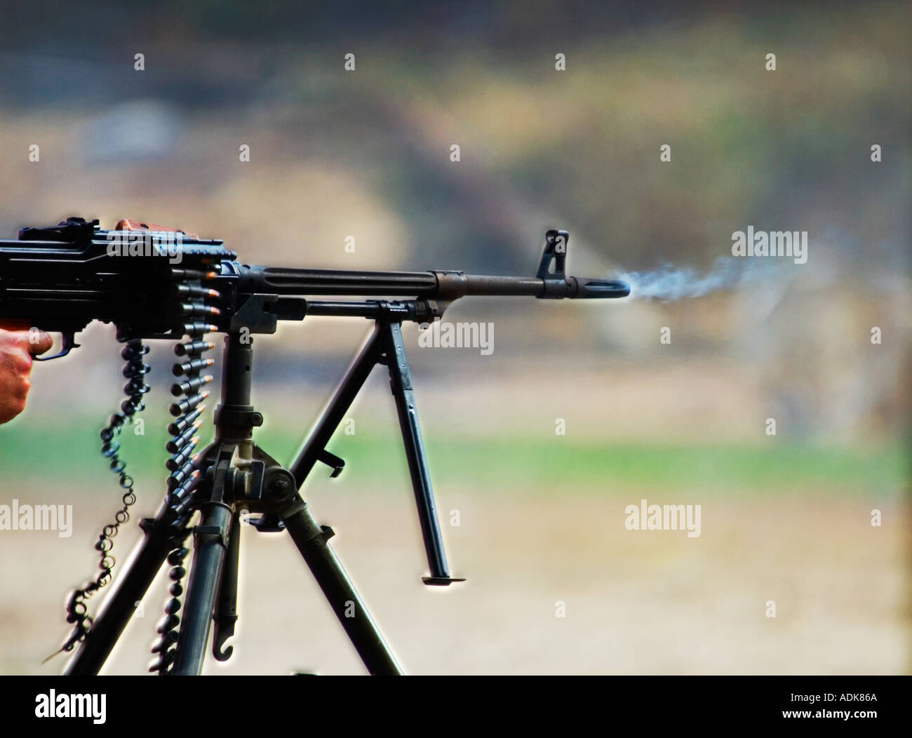 Machine gun being fired on range Stock Photo - Alamy