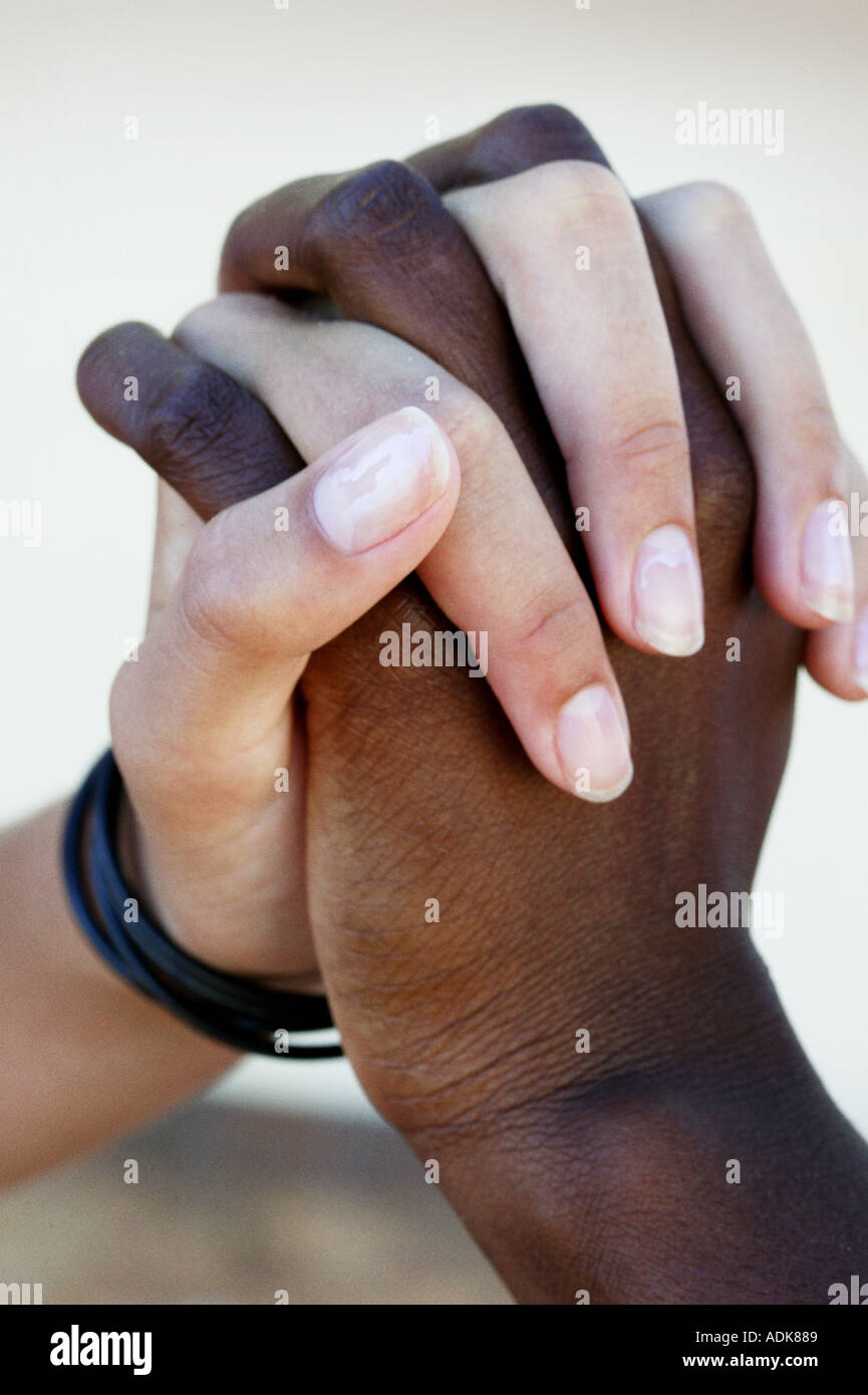 Black white hands hi-res stock photography and images - Alamy