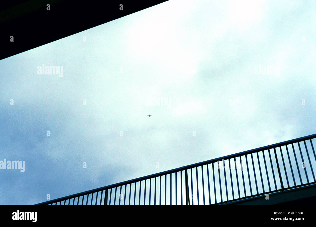 plane in sky over fly over Stock Photo - Alamy