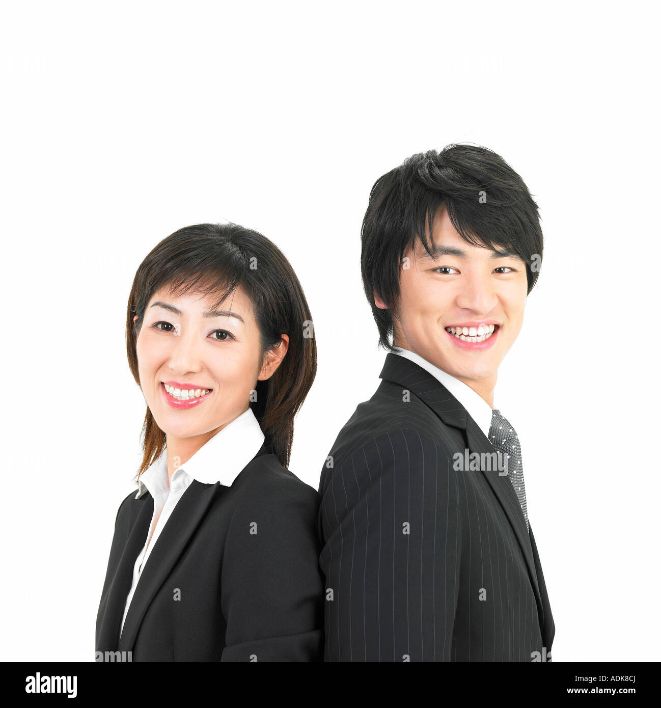 a businesswoman and a businessman making a smile Stock Photo - Alamy