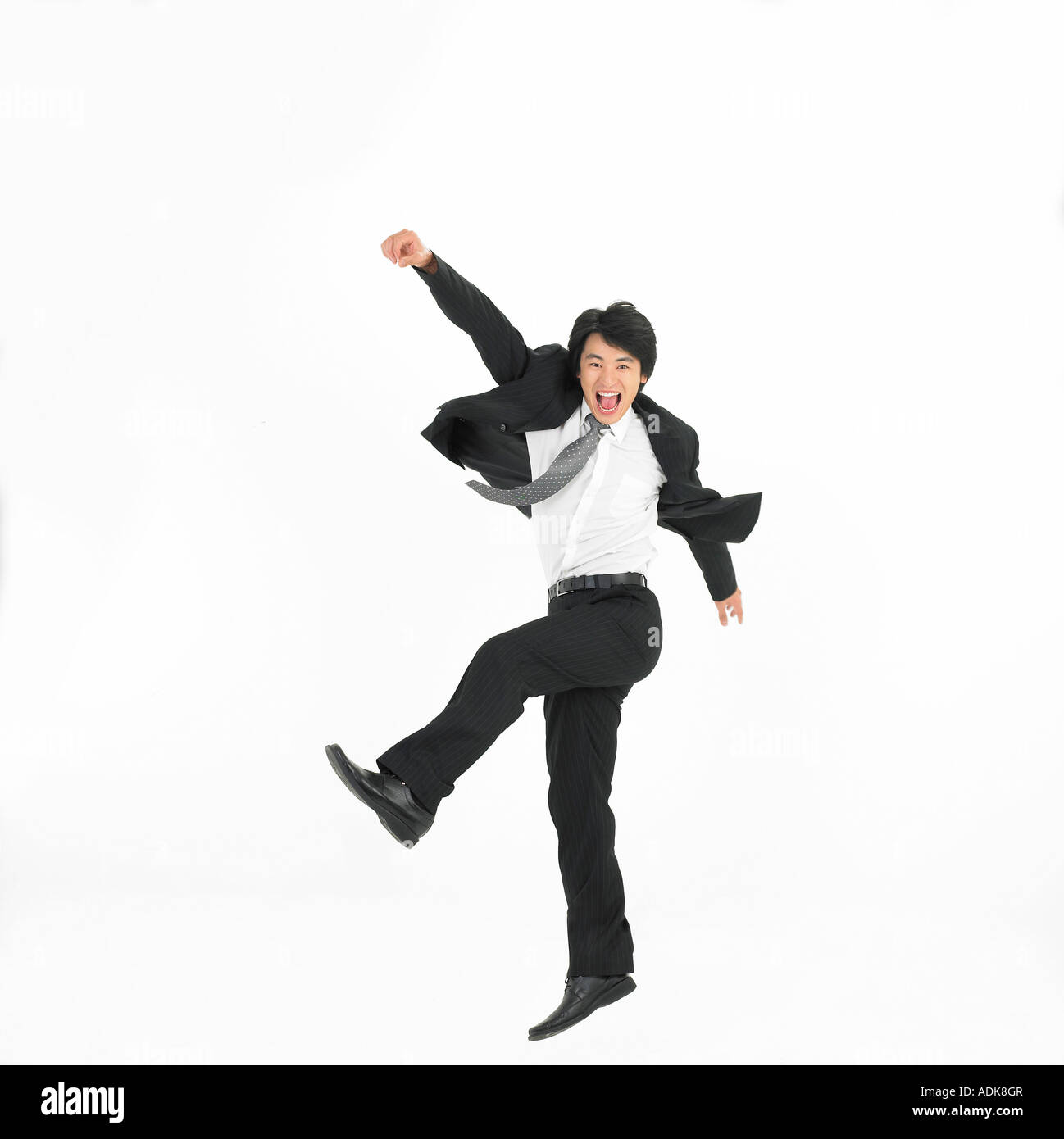 a businessman jumping up Stock Photo - Alamy