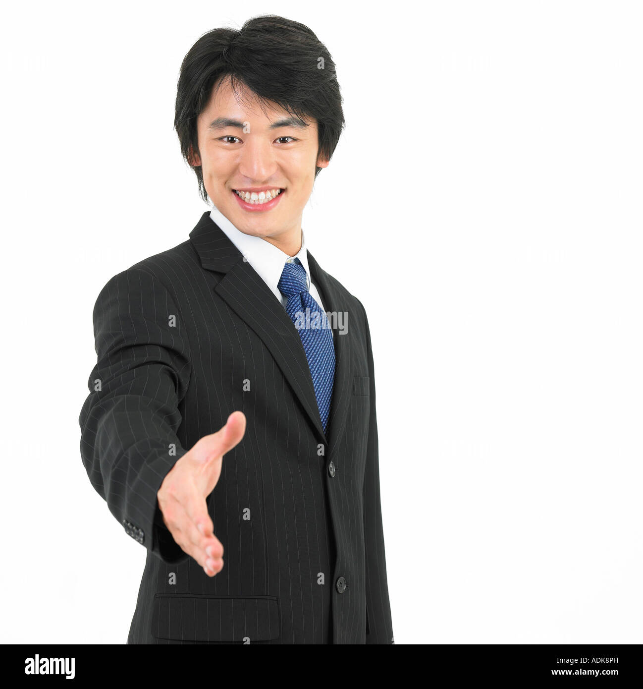 a businessman offering his hand Stock Photo - Alamy