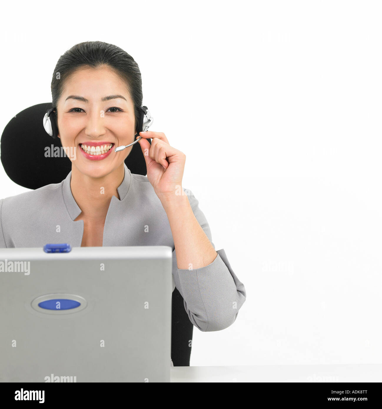 a businesswoman making a smile Stock Photo - Alamy