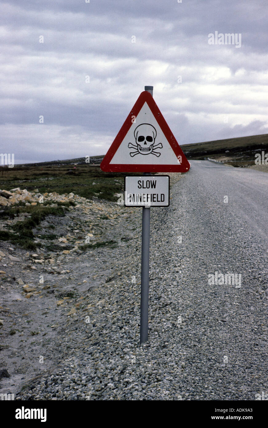 Signs Signpost Mine field sign Falklands Stock Photo - Alamy