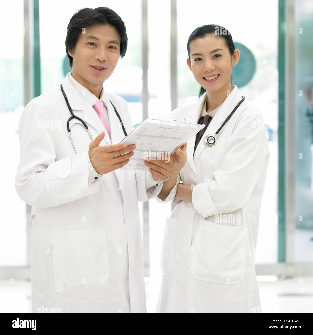 medicine a doctor writing a medical chart Stock Photo - Alamy