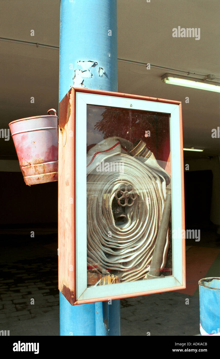 emergency fire hose and bucket Stock Photo - Alamy