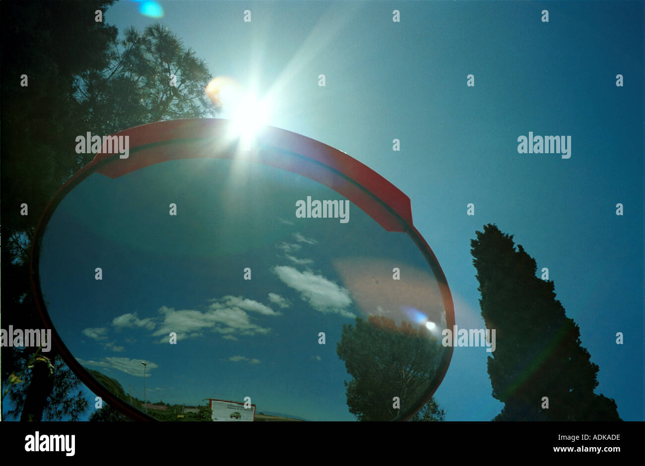 road safety circular mirror and countryside Stock Photo - Alamy