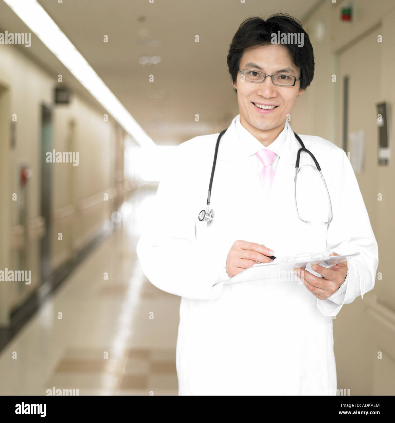 medicine a doctor writing a medical chart Stock Photo - Alamy