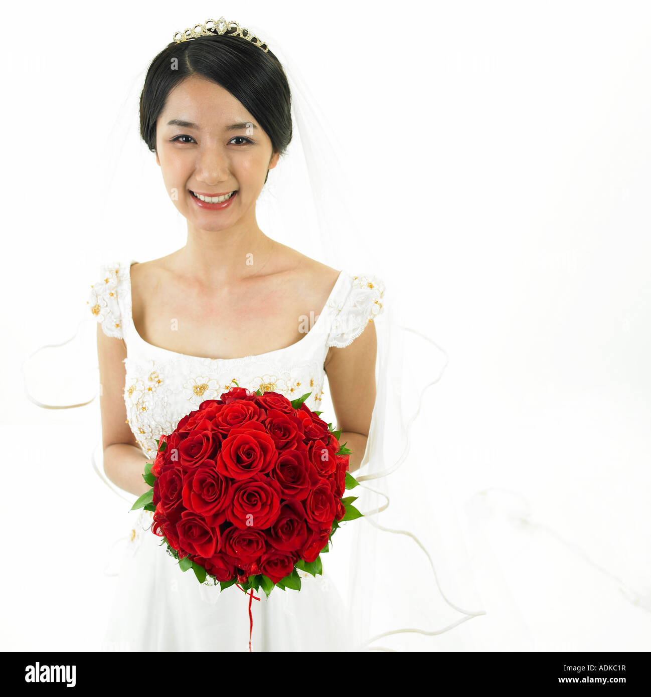a bride holding a bouquet Stock Photo - Alamy