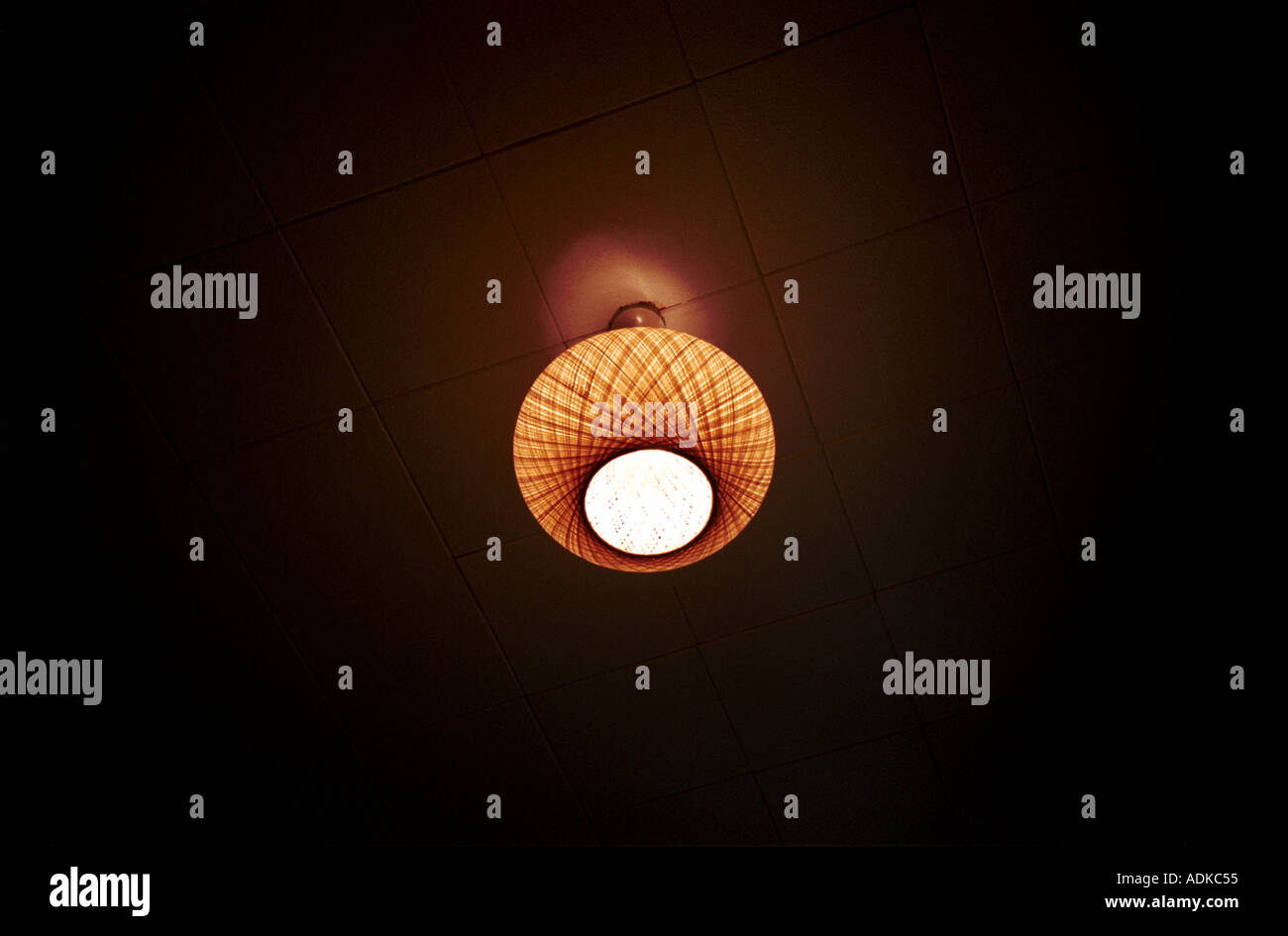 lit ceiling lamp with lampshade Stock Photo - Alamy
