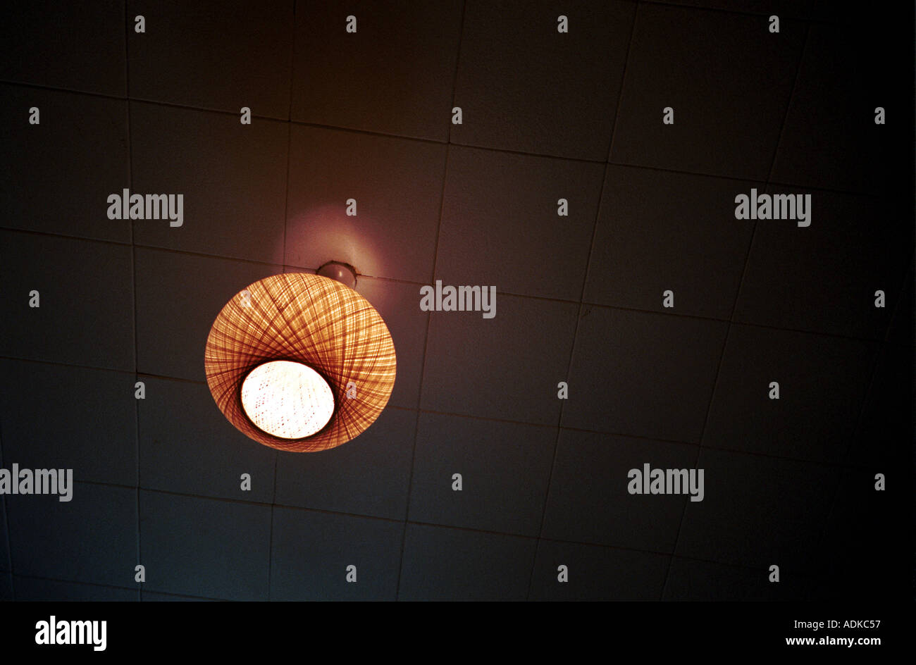 lit ceiling lamp with lampshade Stock Photo - Alamy