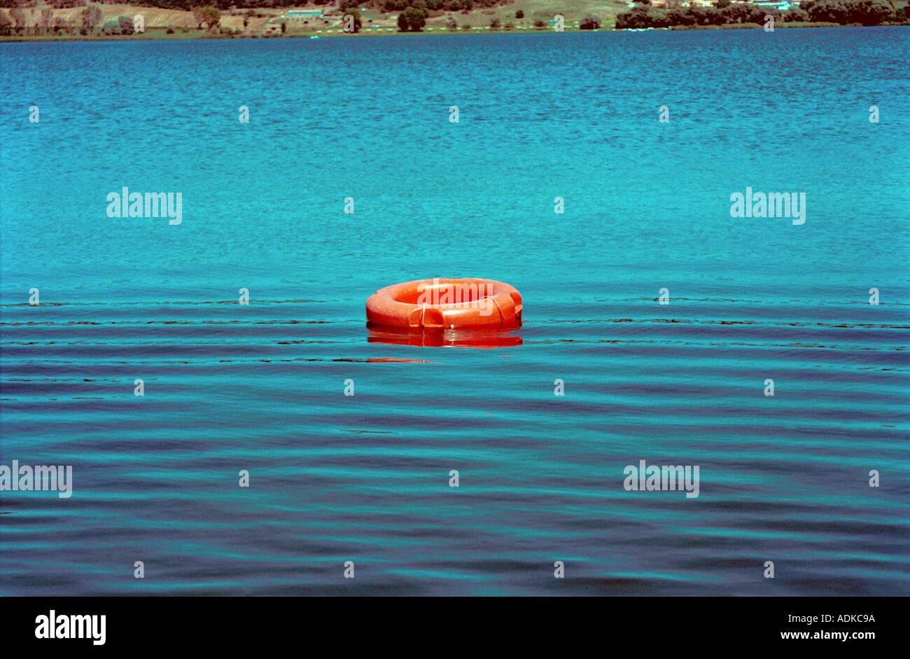 Life belt floating in ocean hi-res stock photography and images - Alamy