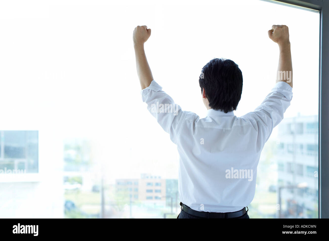a stretching businessman Stock Photo - Alamy