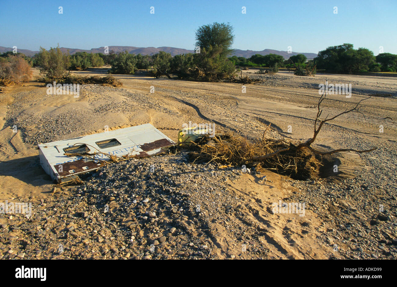Remains of a truck caught up in a rare flash flood in the Namib Desert ...
