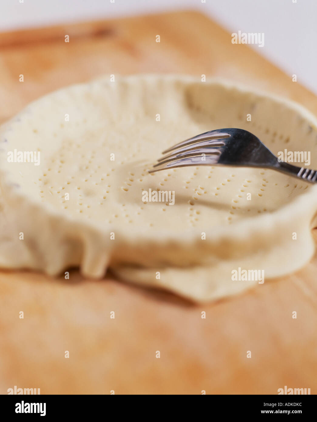 cuisine dough with push stick pizza making process Stock Photo - Alamy