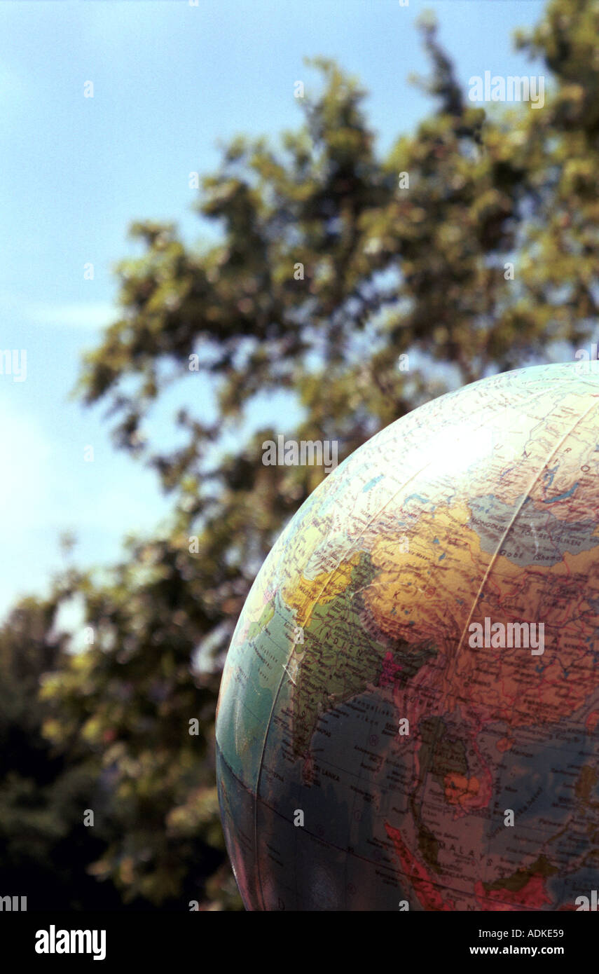 world globe and tree Stock Photo - Alamy