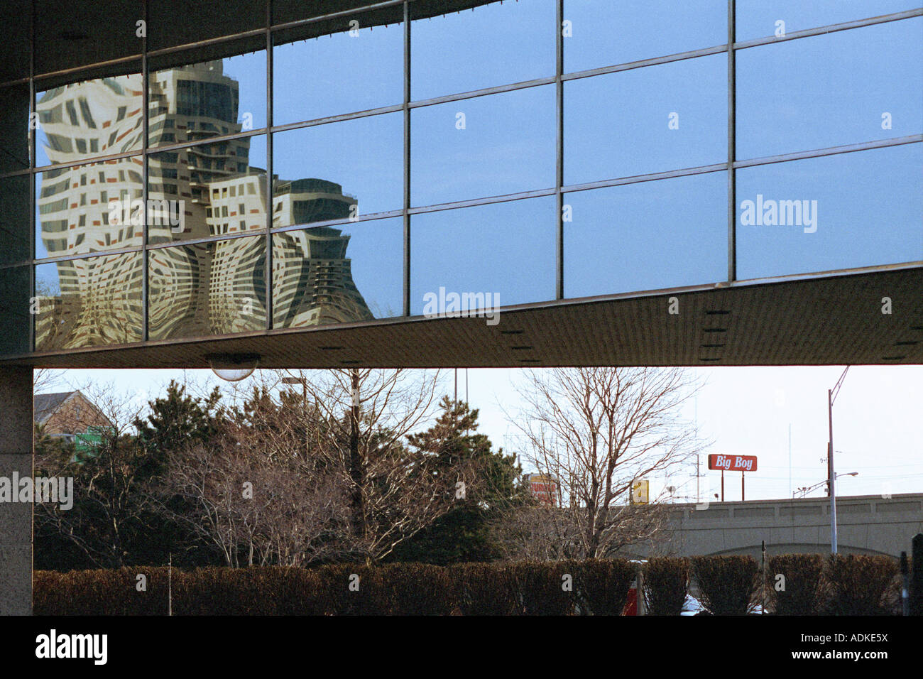 geometric building glass window reflection with sky and trees Stock ...