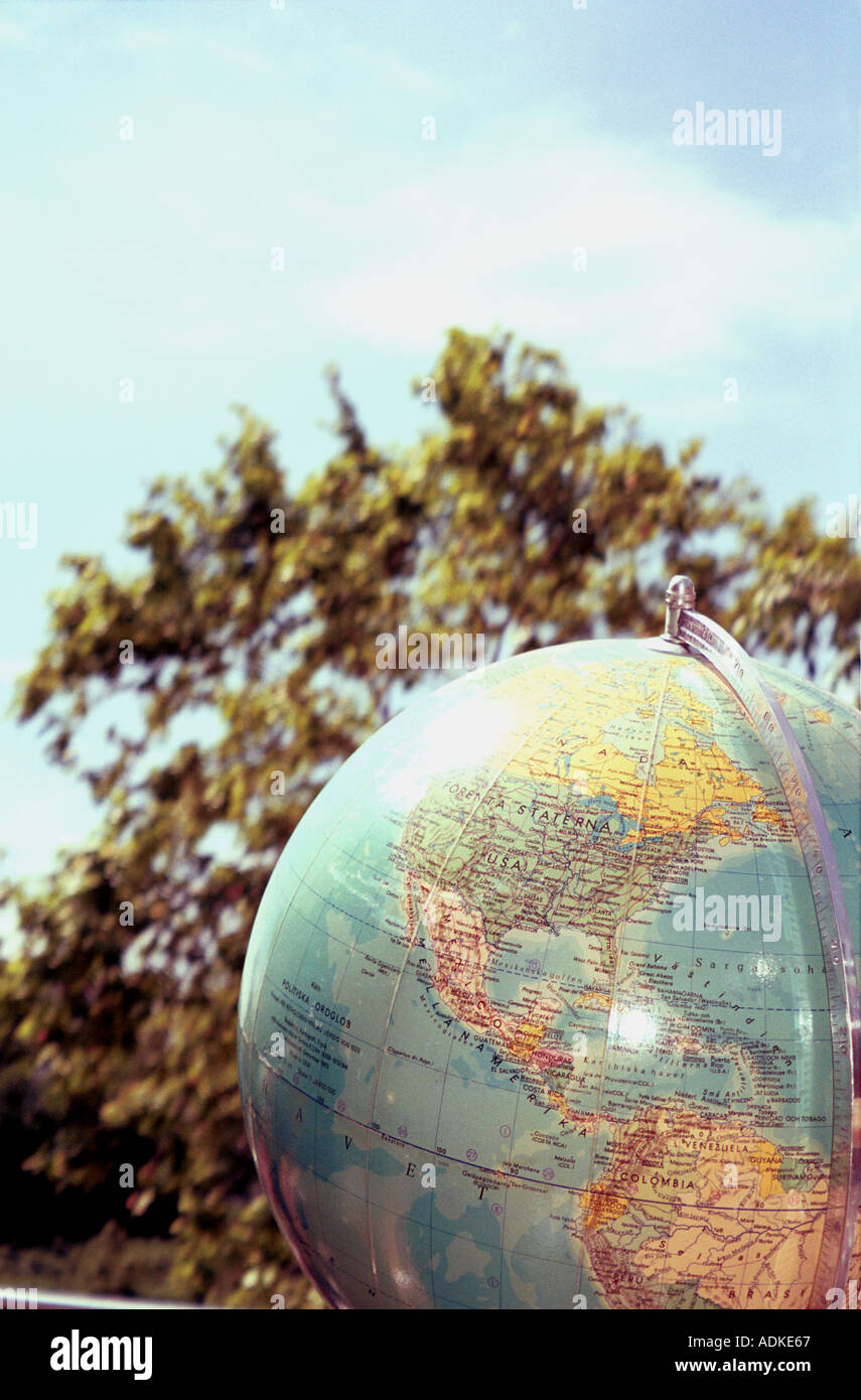 world globe and tree Stock Photo - Alamy