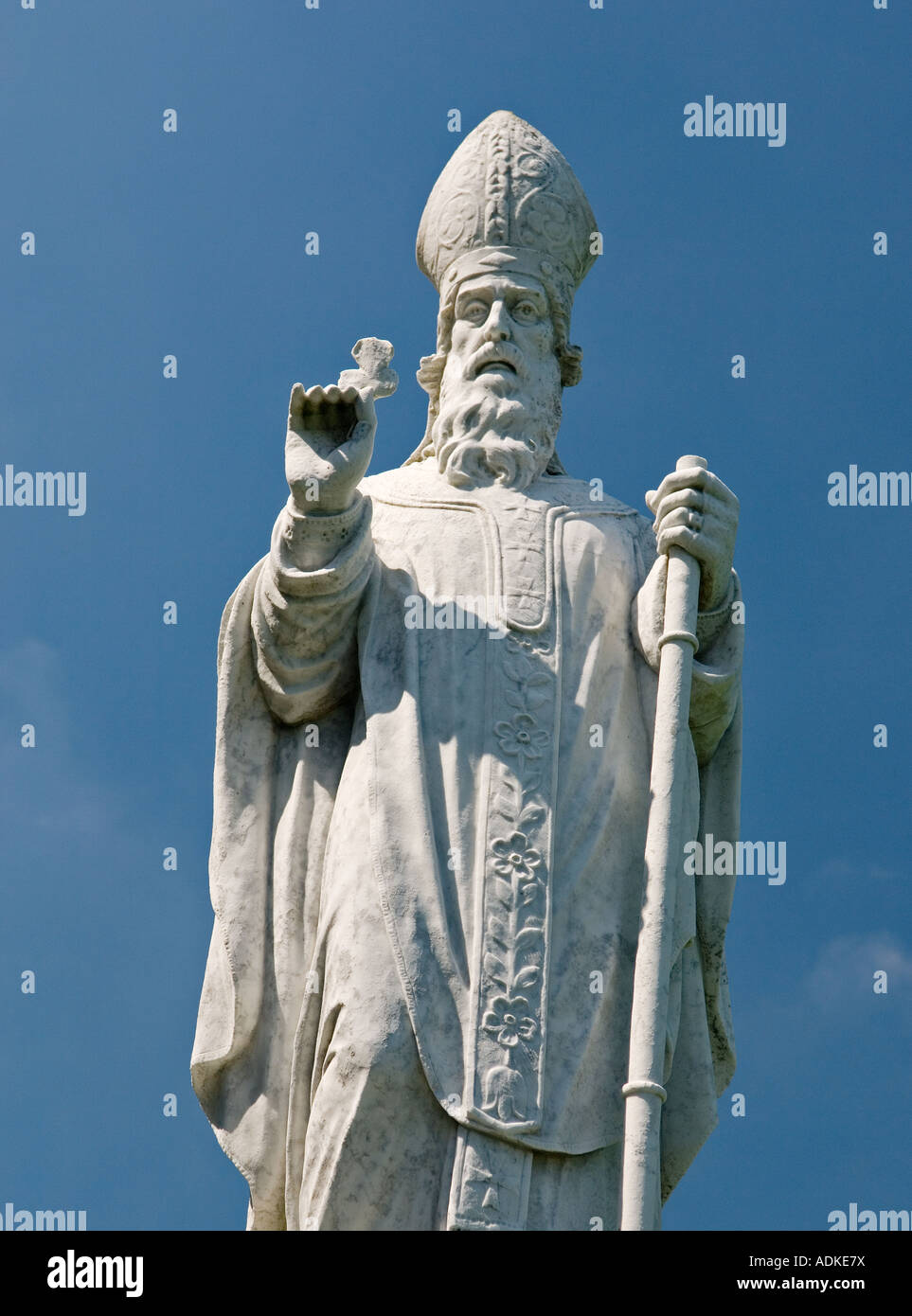 St. Patrick holding shamrock looks down on the Hill of Tara, ancient ...