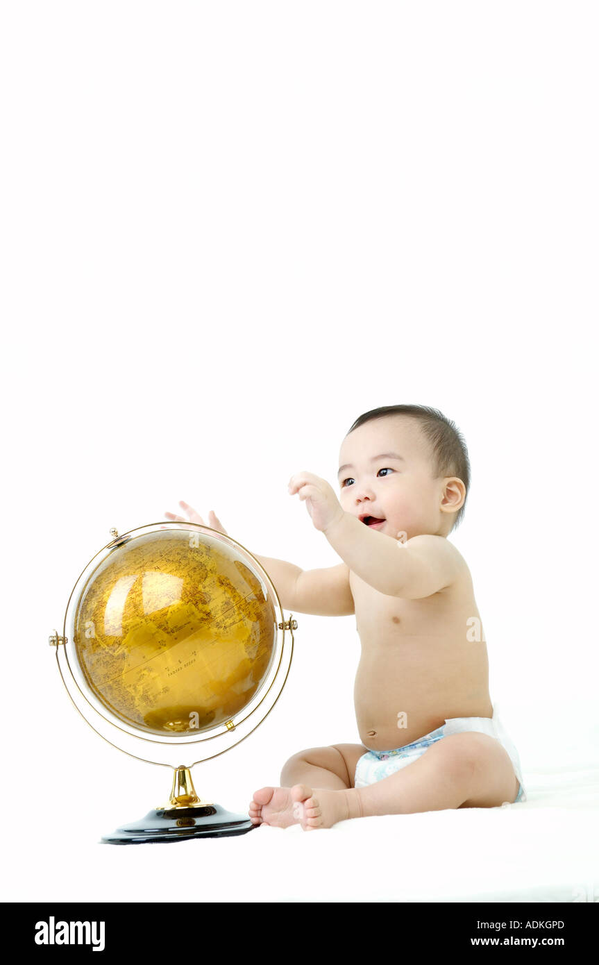 Baby in front globe hi-res stock photography and images - Alamy