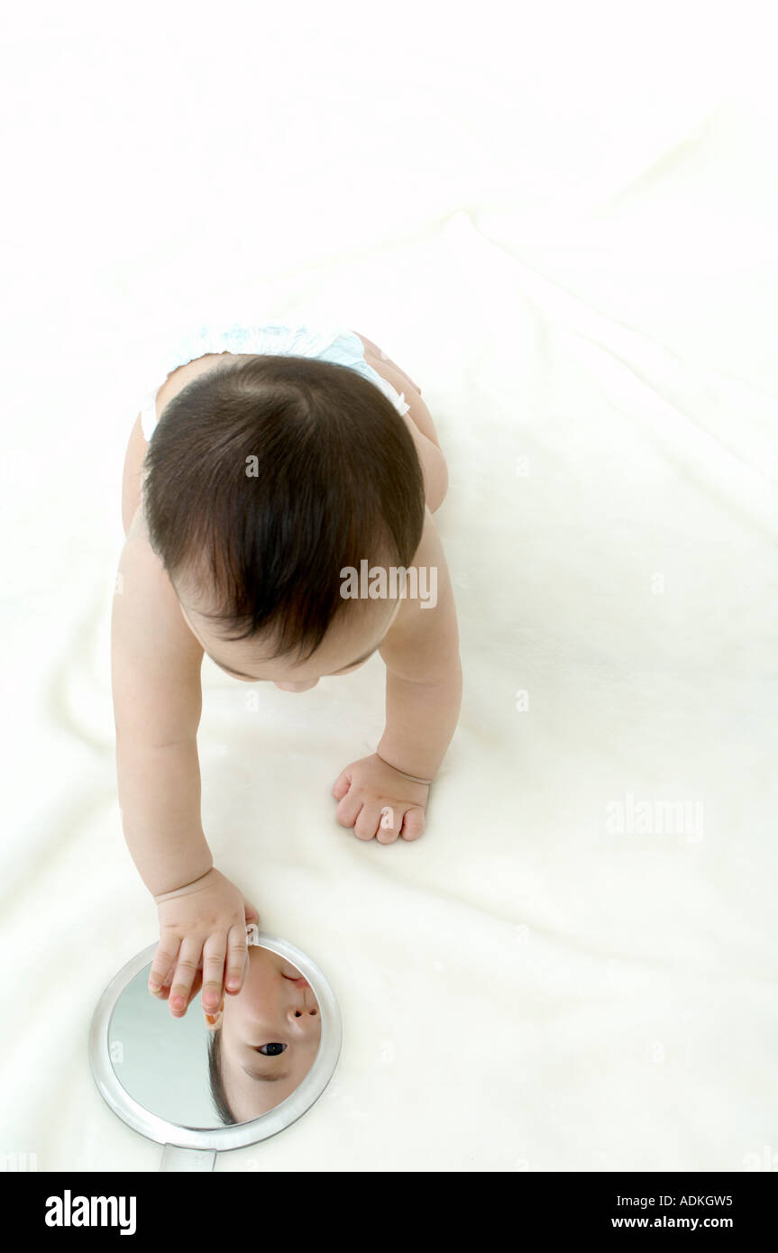 Baby and mirror hi-res stock photography and images - Alamy
