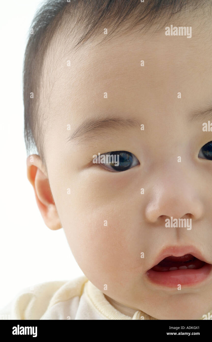 a baby s face Stock Photo - Alamy