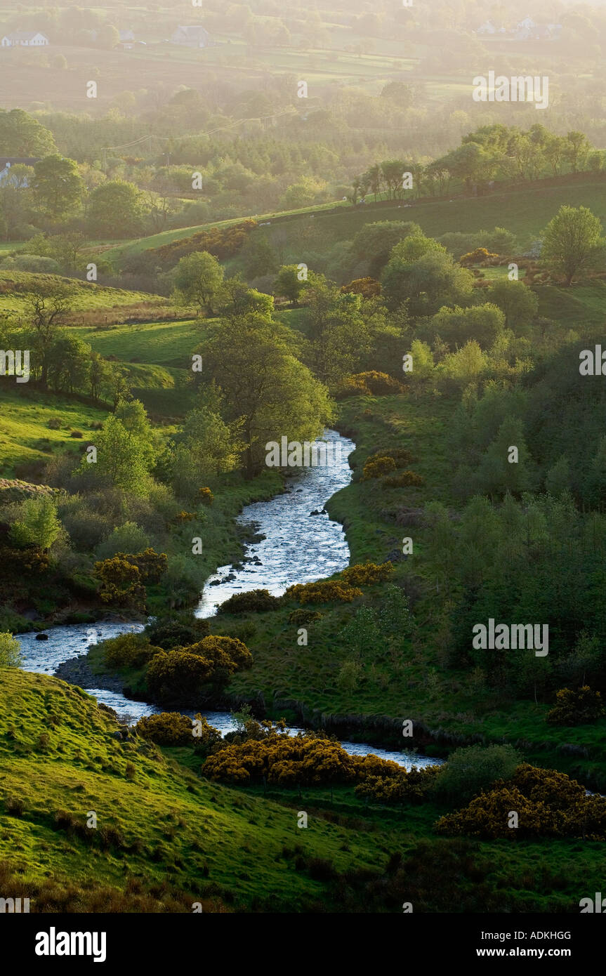 Mountain stream in lush valley of the River Roe near Dungiven, below ...